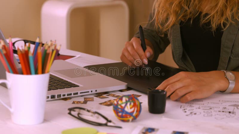 Graphic Designer Graphic Designer, Demonstrating Her Design Skills ...