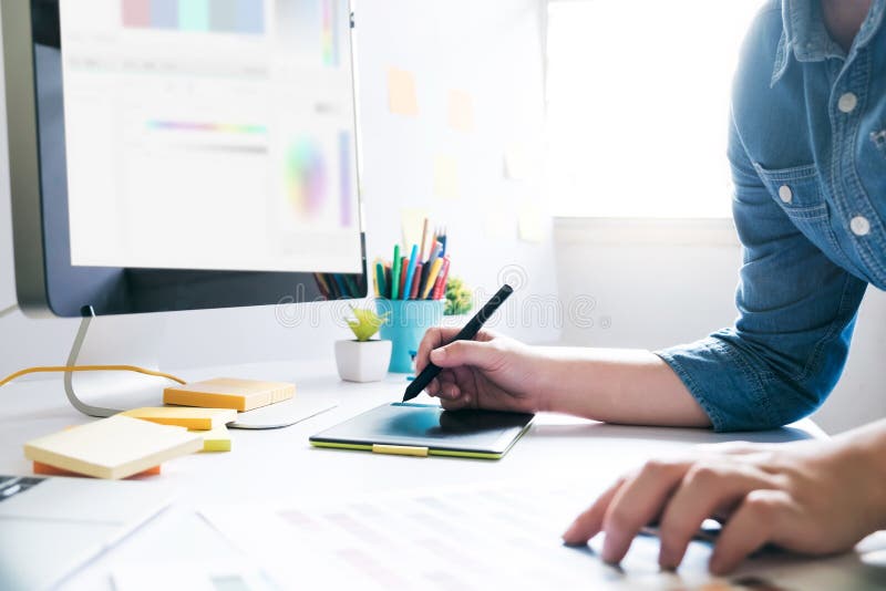 Graphic Designer Using Graphics Tablet To Do Work Stock Image - Image ...
