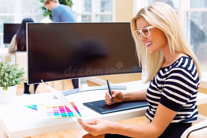 Graphic Designer Using Graphics Tablet Stock Photo - Image of ...