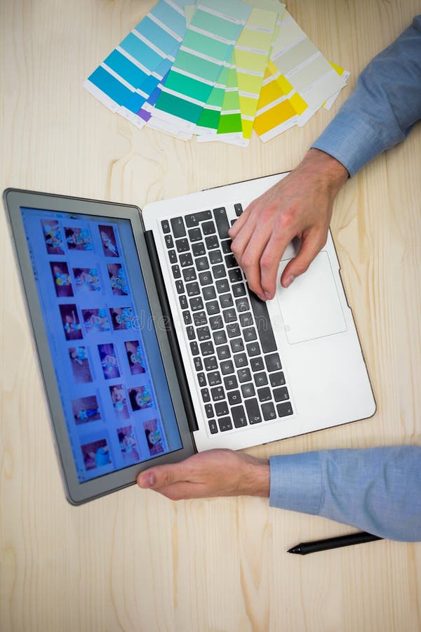 Graphic Designer Using Laptop at His Desk Stock Image - Image of career ...