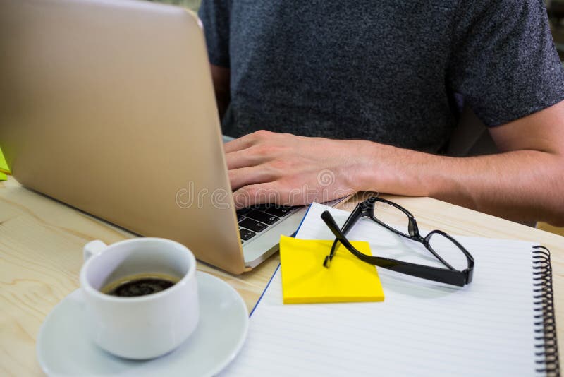 Graphic Designer Using Laptop at His Desk Stock Image - Image of ...
