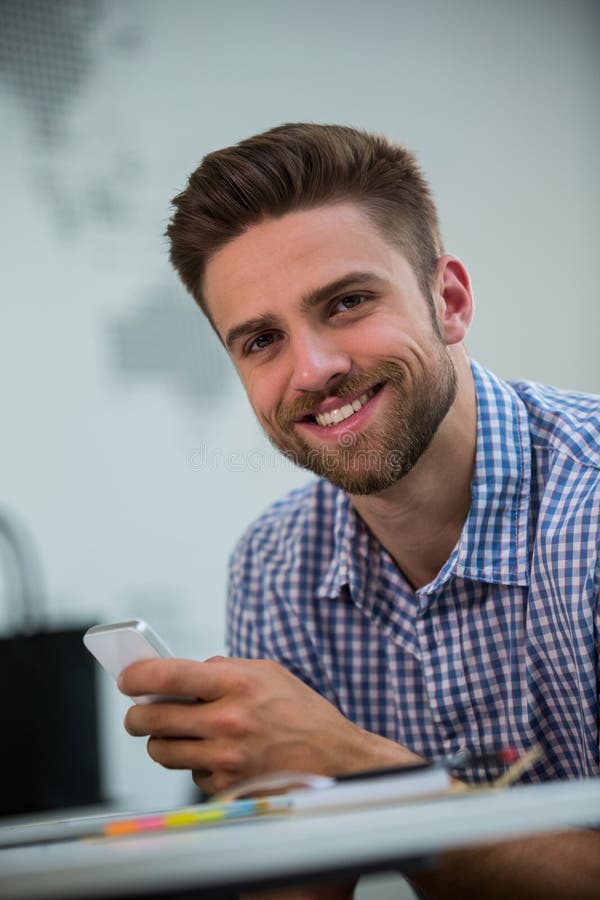 Graphic Designer Using Mobile Phone Stock Photo - Image of lifestyle ...