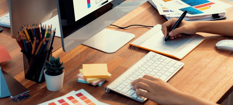 Graphic Designer Works on Computer Laptop with Digital Pen. Scrutinize ...