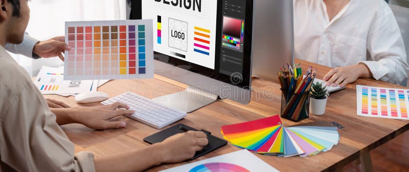 Graphic Designer Works on Computer Laptop with Digital Pen. Scrutinize ...