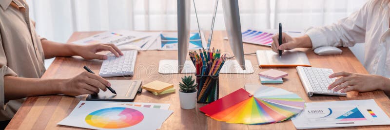 Graphic Designer Works on Computer Laptop with Digital Pen. Scrutinize ...