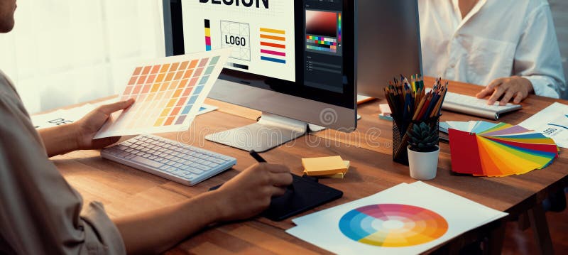 Graphic Designer Works on Computer Laptop with Digital Pen. Scrutinize ...