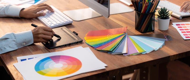 Graphic Designer Works on Computer Laptop with Digital Pen. Scrutinize ...
