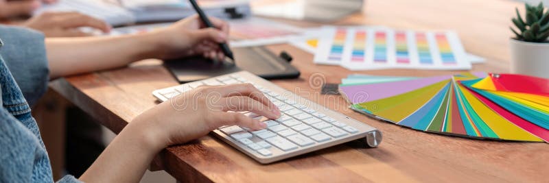 Graphic Designer Works on Computer Laptop with Digital Pen. Scrutinize ...