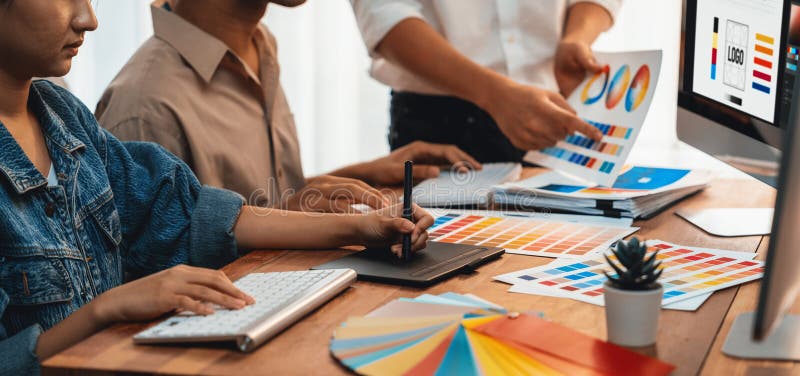 Graphic Designer Works on Computer Laptop with Digital Pen. Scrutinize ...