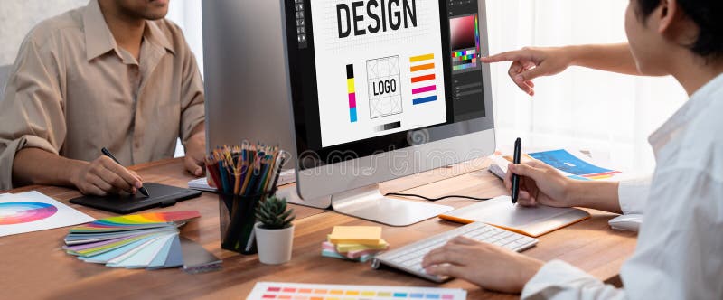 Graphic Designer Works on Computer Laptop with Digital Pen. Scrutinize ...