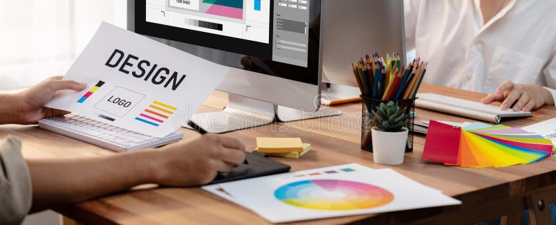 Graphic Designer Works on Computer Laptop with Digital Pen. Scrutinize ...