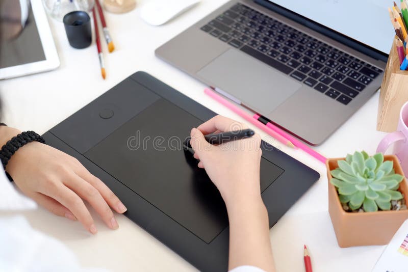 Graphic designer at work. stock image. Image of graphic - 112370205