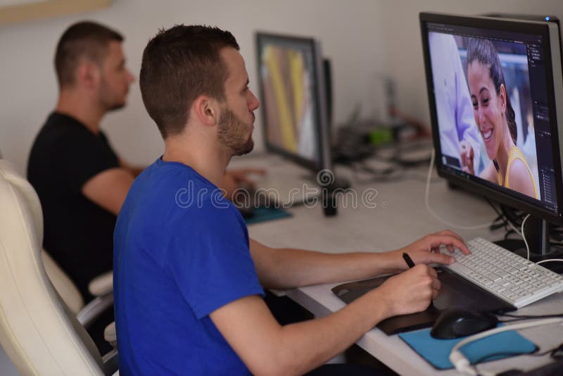 Graphic designer at work stock image. Image of device - 81811745