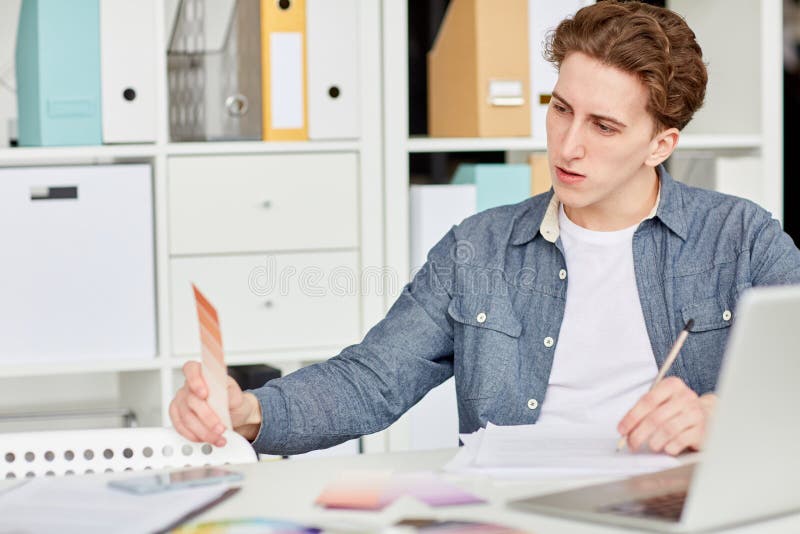 Graphic designer at work stock photo. Image of office - 113979762