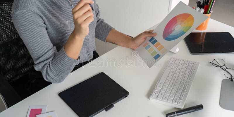 Creative Graphic Designer Working on Color Palette and Digital Tablet ...
