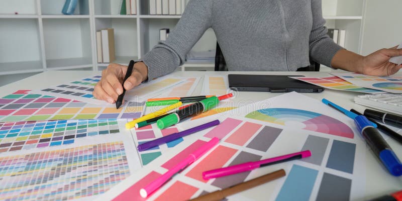 Creative Graphic Designer Working with Color Swatches and Design Tools ...