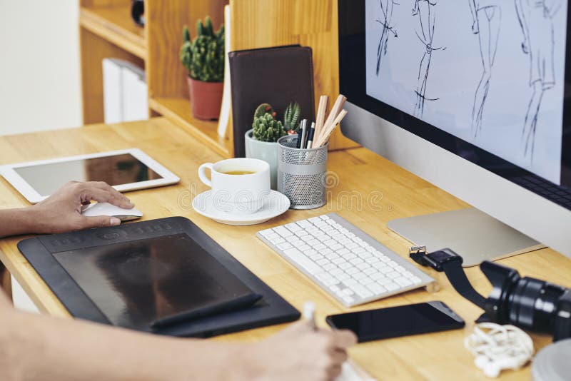 Graphic Designer Working on Computer Stock Photo - Image of document ...