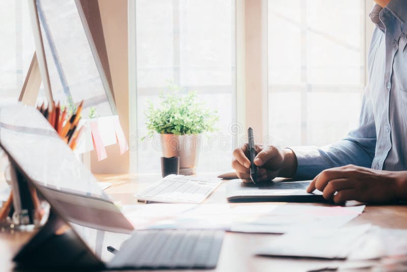 Graphic Designer Working on Computer and Used Graphics Tablet Stock ...