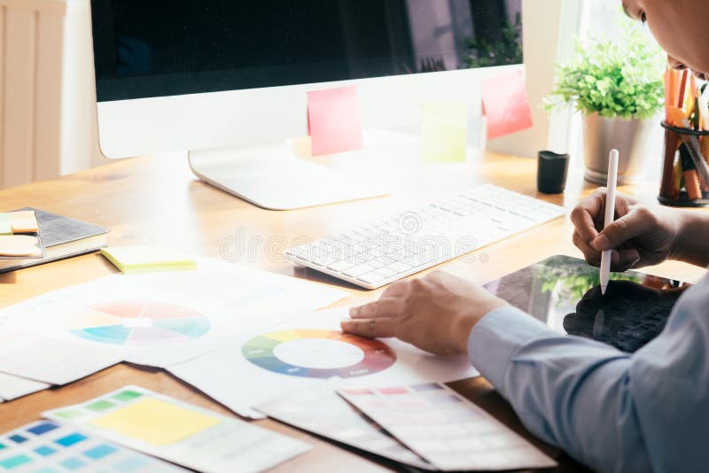 Graphic Designer Working on Computer and Used Graphics Tablet Stock ...