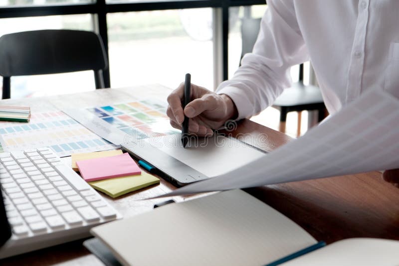 Graphic Designer Working on Digital Tablet. Artist Drawing on Graphic ...