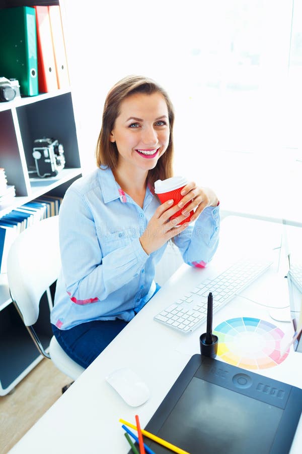 Graphic Designer Working at the Home Office - Modern Business Co Stock ...