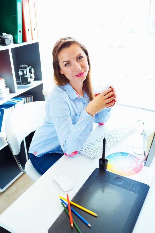 Graphic Designer Working at the Home Office - Modern Business Co Stock ...