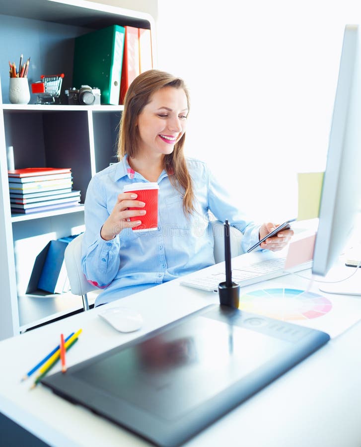 Graphic Designer Working at the Home Office - Modern Business Co Stock ...