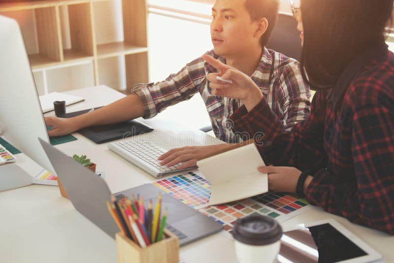 Graphic Designer Working in Office. Stock Photo - Image of desk ...