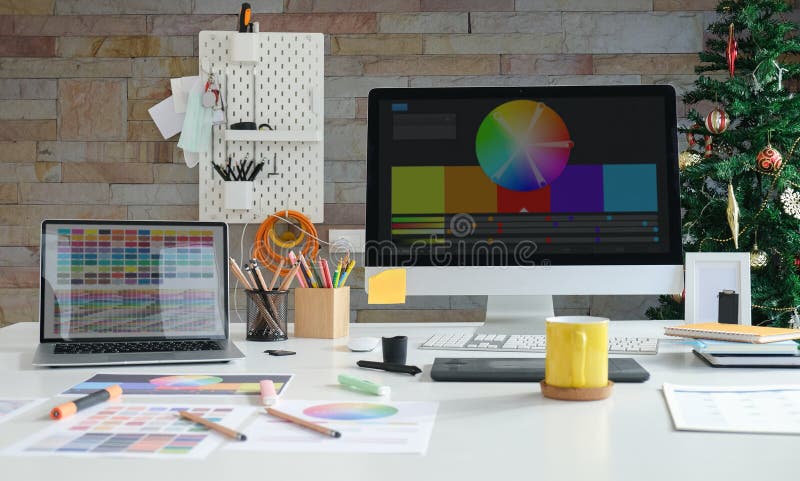 Graphic Designer Workplace with Computer, Laptop and Colour Swatch on ...