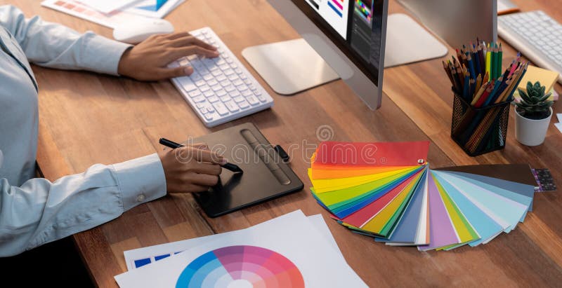 Graphic Designer Works on Computer Laptop with Digital Pen. Scrutinize ...