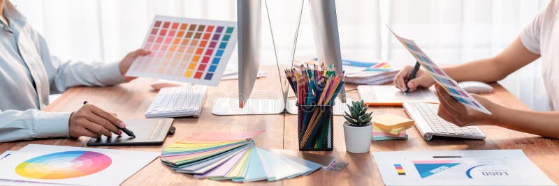 Graphic Designer Works on Computer Laptop with Digital Pen. Scrutinize ...