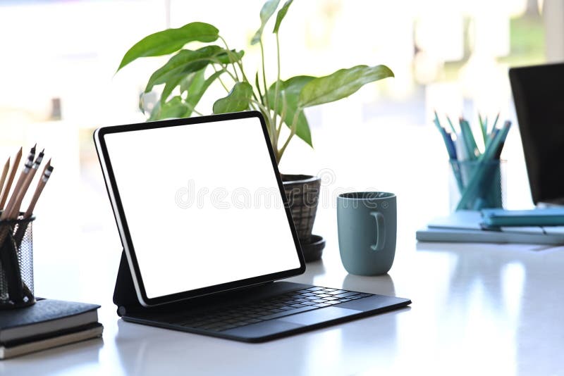 Graphic Designer Workstation with Tablet Computer, Plant, Stationery ...