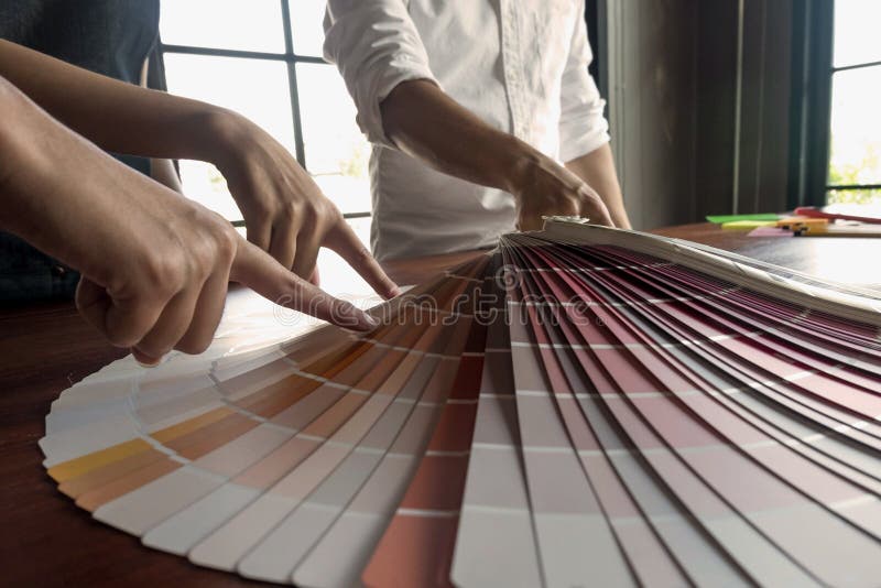 Graphic Designers Choose Colors from the Color Bands Samples for Design ...