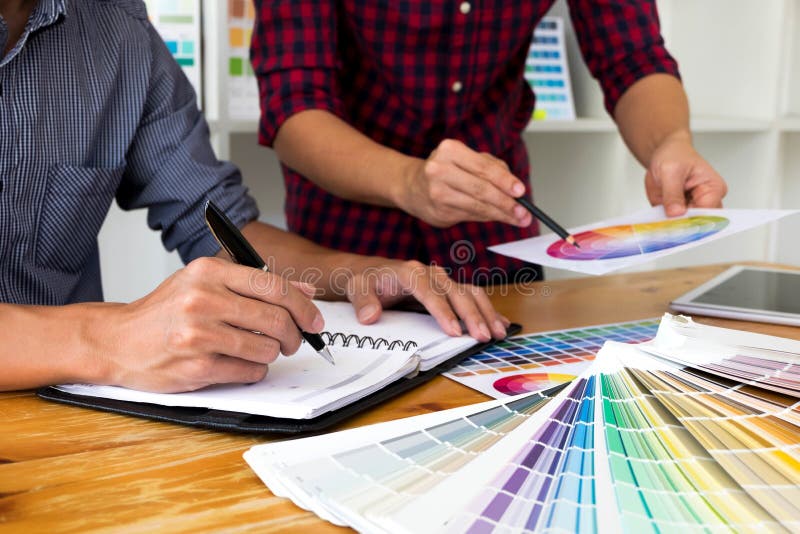 Graphic Designers Choose Colors from the Color Bands Samples for Design ...