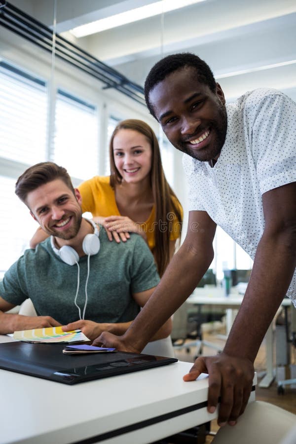 Graphic Designers at Their Desk Stock Image - Image of career, color ...