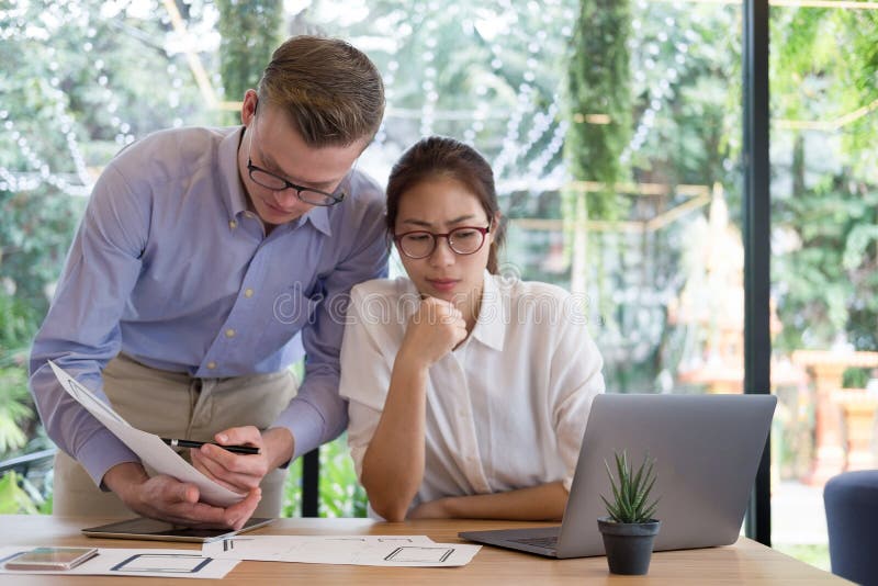 Graphic Designers Work Together with Computer Designing Application for ...