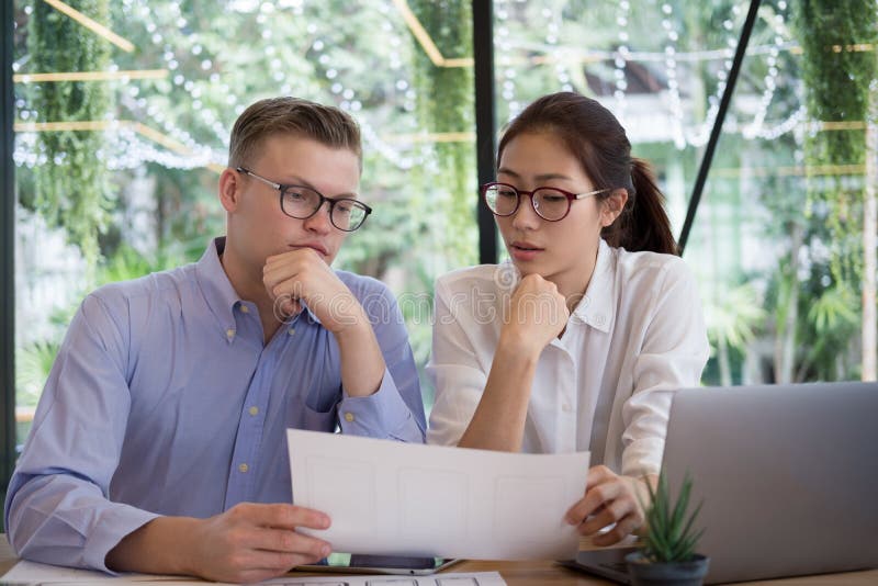 Graphic Designers Work Together with Computer Designing Application for ...