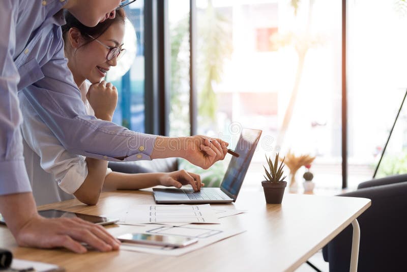 Graphic Designers Work Together with Computer Designing Application for ...