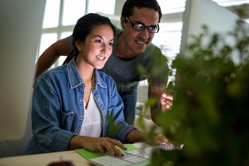 Graphic Designers Working at Desk Stock Image - Image of business ...