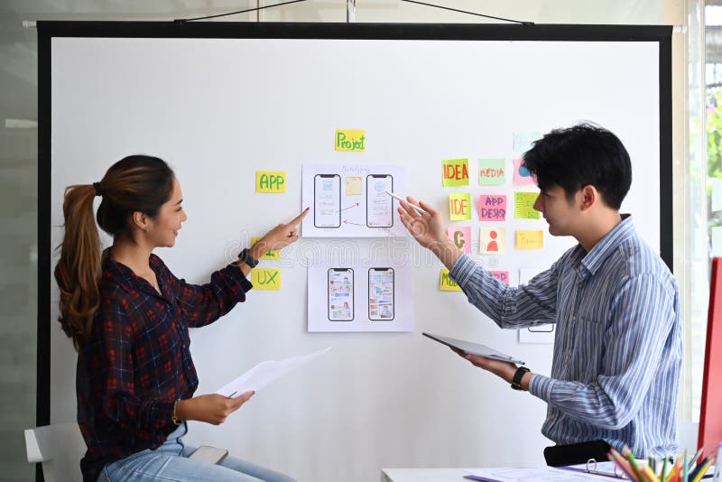 Graphic Designers Working with UX Designer Designing Framework Layout ...