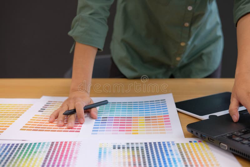 Graphic Interior Designer Working with Computer & Choosing Color Stock ...