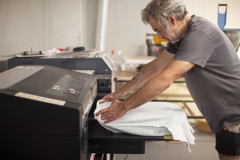 Graphic Print Technician Work on Digital T-shirt Printing Machine ...