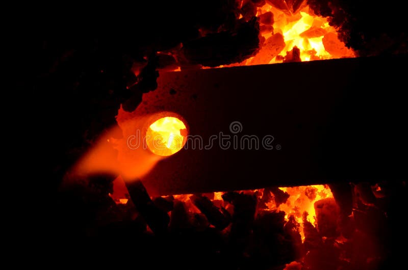 The Process of Heating a Metal Product on Fire. Stock Photo - Image of ...