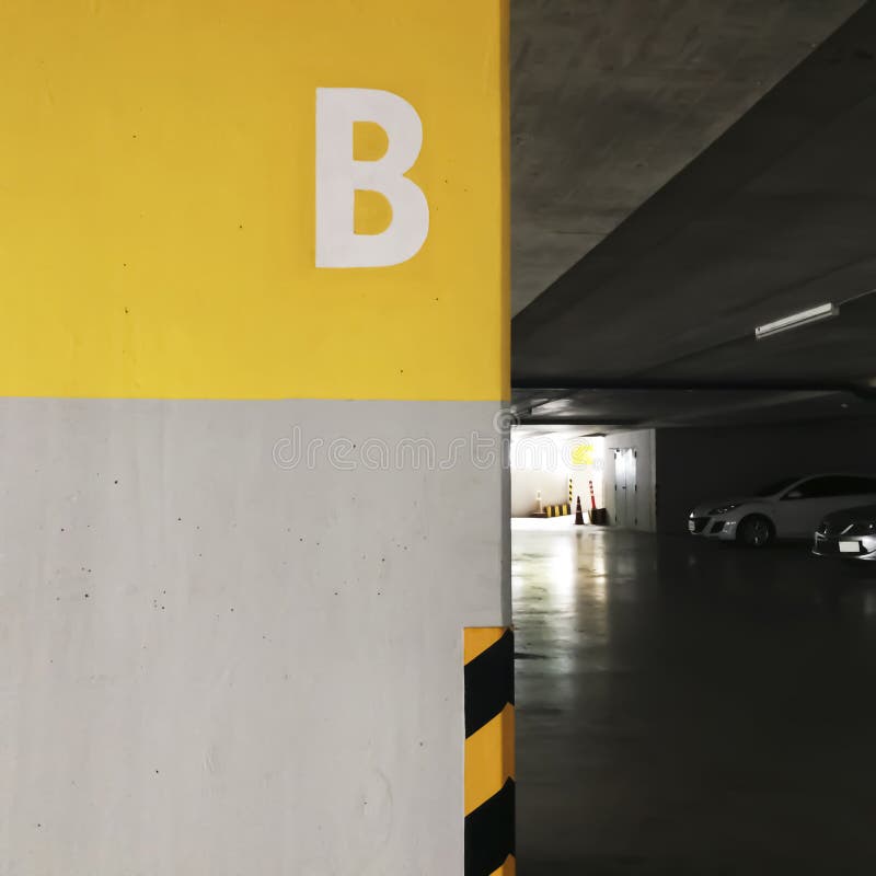 Graphic Signage in Parking Garage. Stock Photo - Image of parking ...