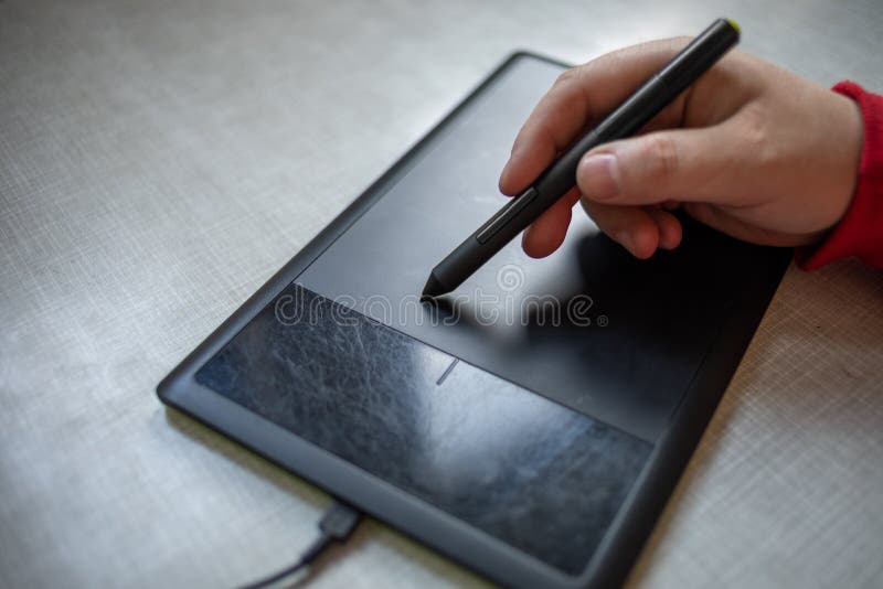 Graphic Table and Pen in Hand of Artist Stock Photo - Image of ...