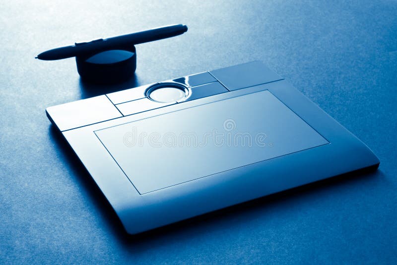 Graphic tablet on blue stock photo. Image of draw, office - 10462554