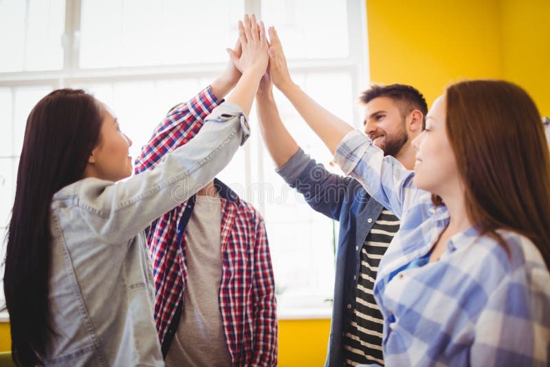 Graphic Team Giving High-five Stock Image - Image of multiethnic ...