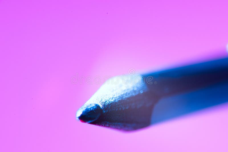 Graphite Blue Pencil on a Bright Colorful Pink Background Stock Image ...