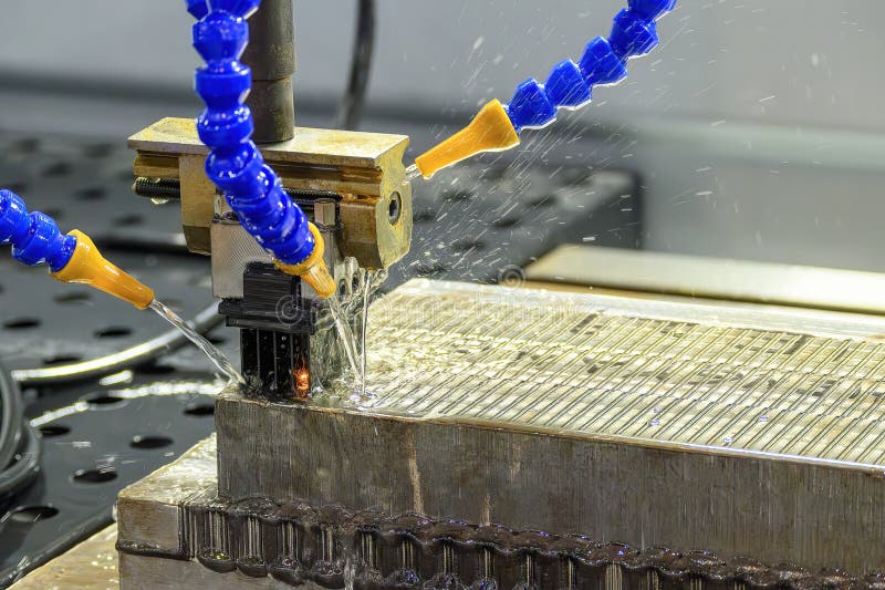 The Graphite Electrode Working on EDM Machine with Liquid Coolant ...