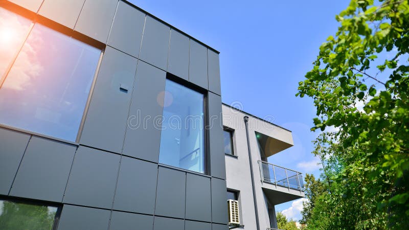 Graphite Facade and Large Windows on a Fragment of an Office Building ...